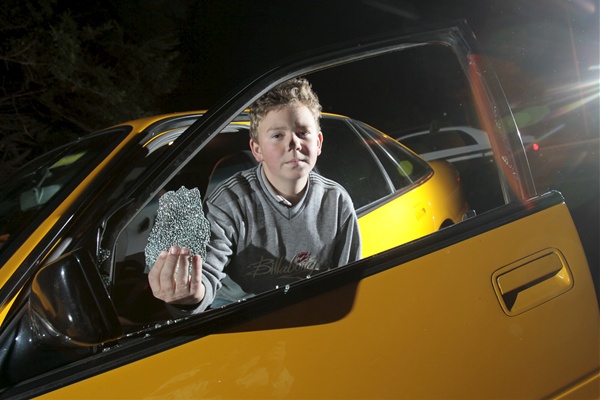 Golf ball smashes through car window | Illawarra Mercury | Wollongong, NSW